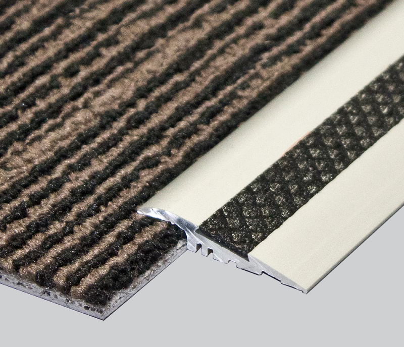 Transition bars remove trip hazards on outdoor matting